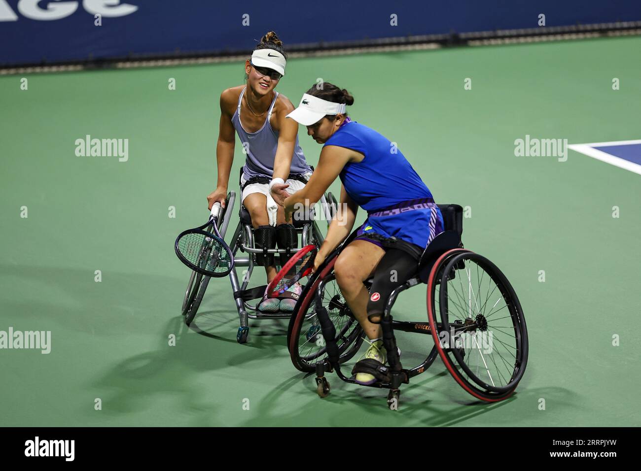 Maylee Phelps and Ksenia Chasteau react during a junior wheelchair ...