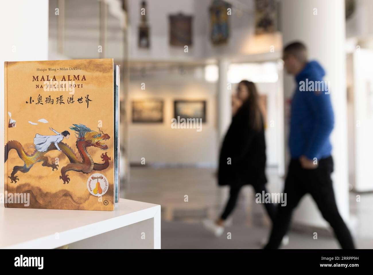 230405 -- LJUBLJANA, April 5, 2023 -- People visit an exhibition of Chinese artist Wang Huiqin ...