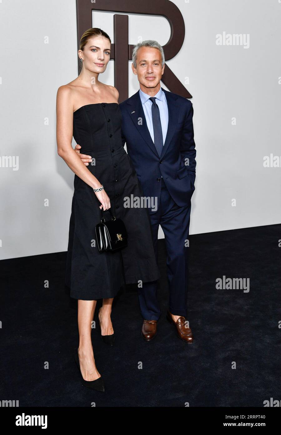 Andrew Lauren, right, and Natascha Schuetz attend the Ralph Lauren ...