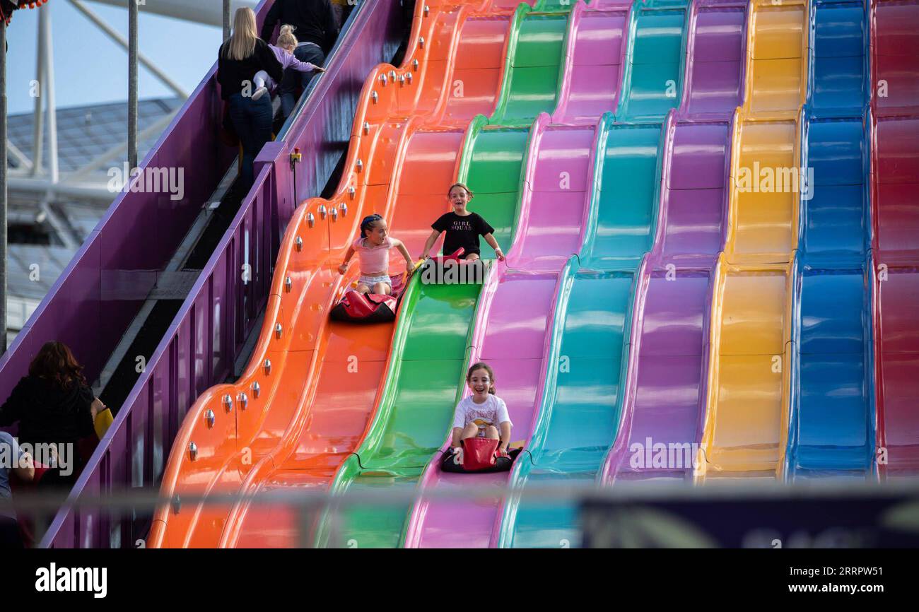 230413 -- SYDNEY, April 13, 2023 -- Kids play on a slide at the Sydney ...
