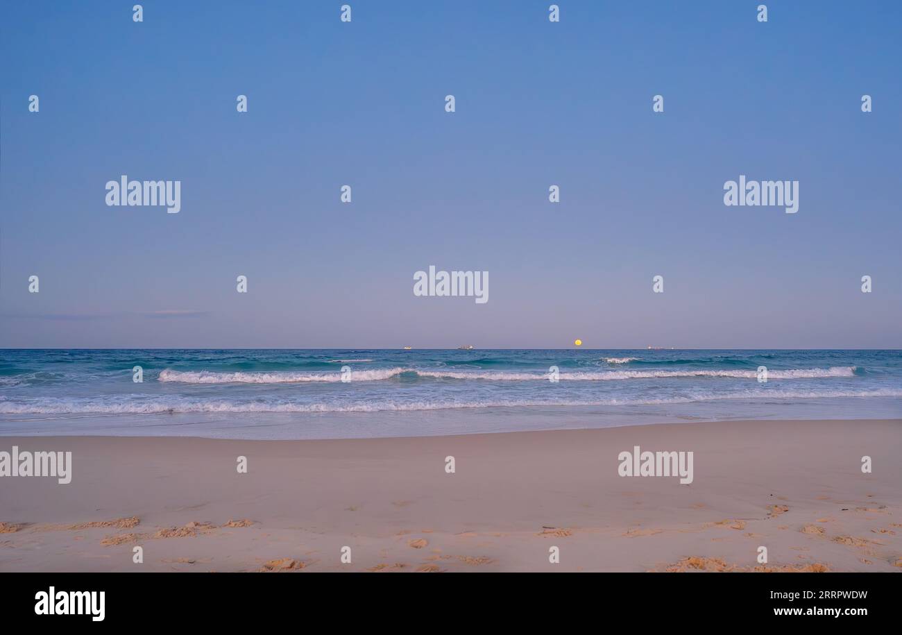 A rare blue moon rising August 2023 above the pacific Ocean seen from ...
