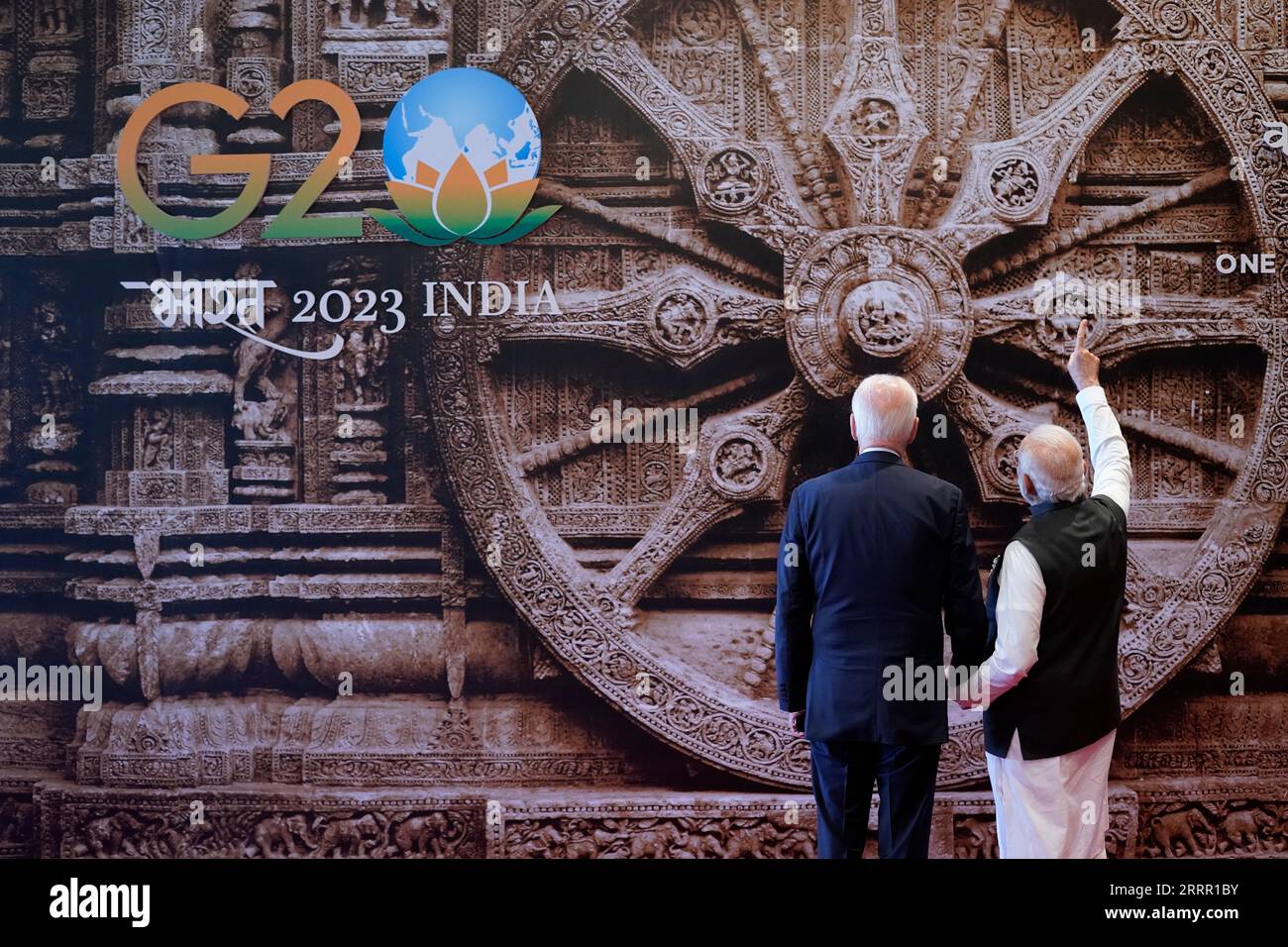 Indian Prime Minister Narendra Modi shows a mural of Konark Sun temple ...