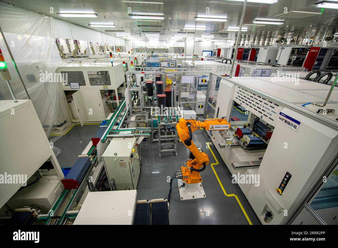 230428 -- HANGZHOU, April 28, 2023 -- A robotic arm works in a factory ...