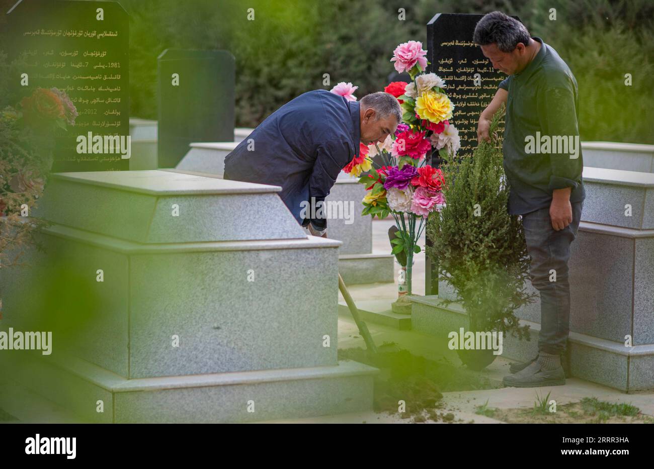 230430 -- YECHENG, April 30, 2023 -- Eniwar Emer L plants a tree in the ...