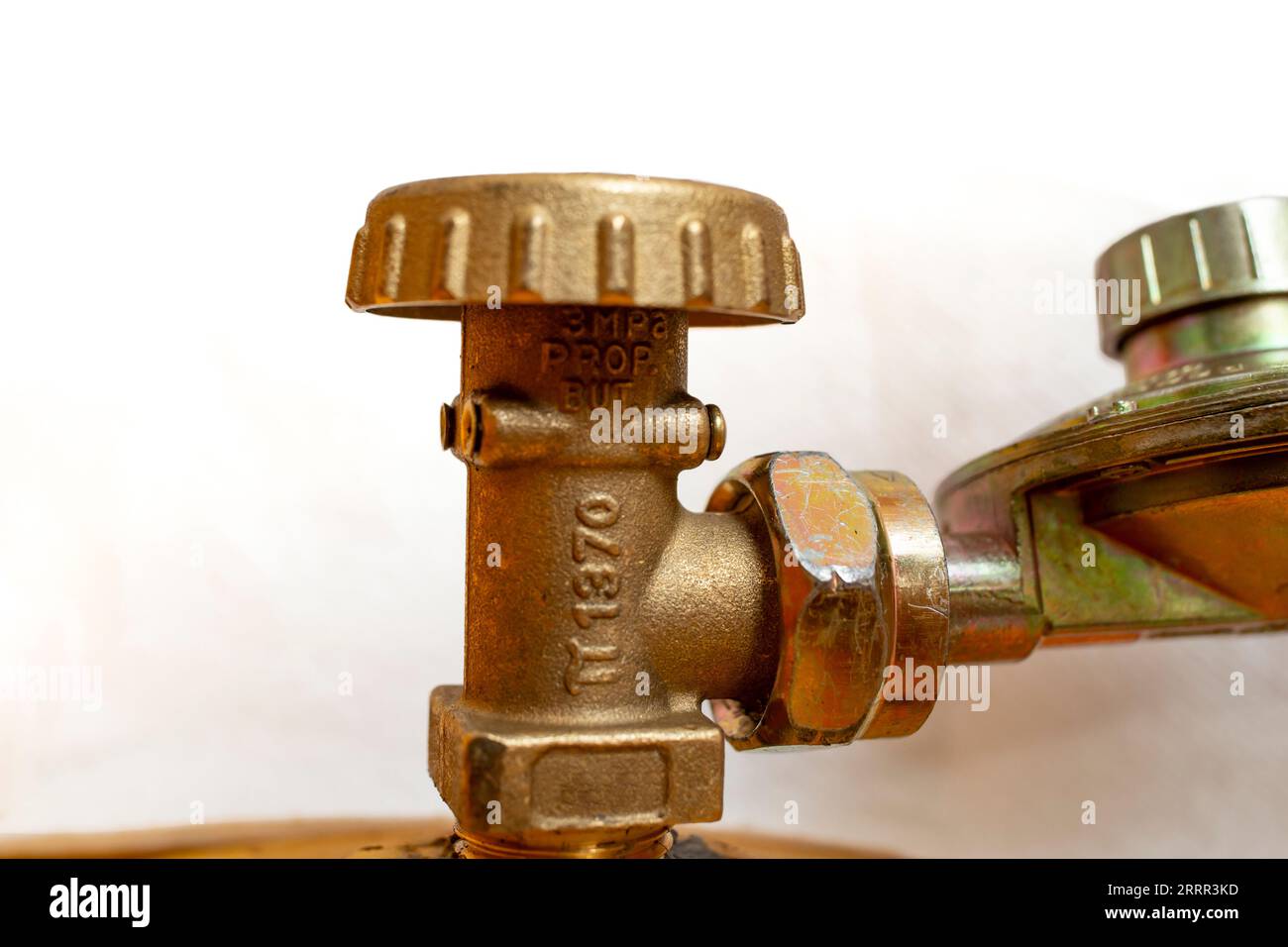Propane gas container faucet, on white background, soft focus close up ...
