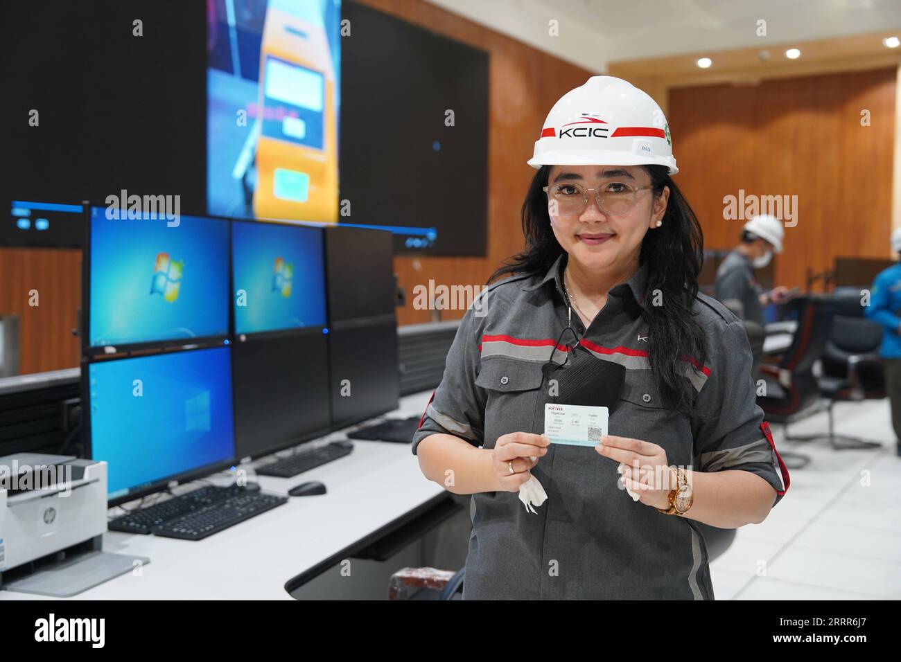 230509 -- BANDUNG, May 9, 2023 -- A staff member shows a sample ticket ...