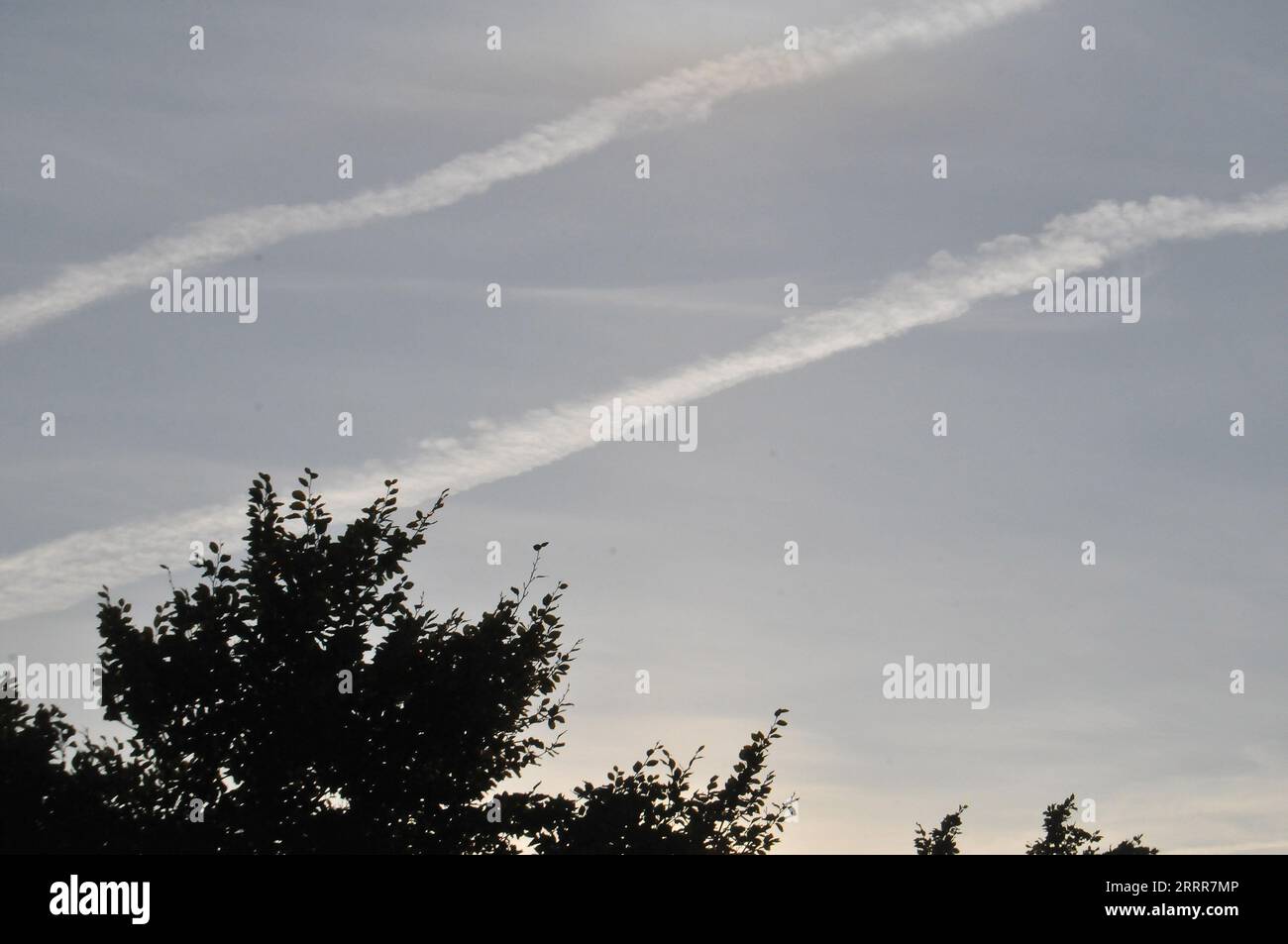 Kastrup/Copenhagen/Denmark/09 September 2023/. White smoke lines sky ...