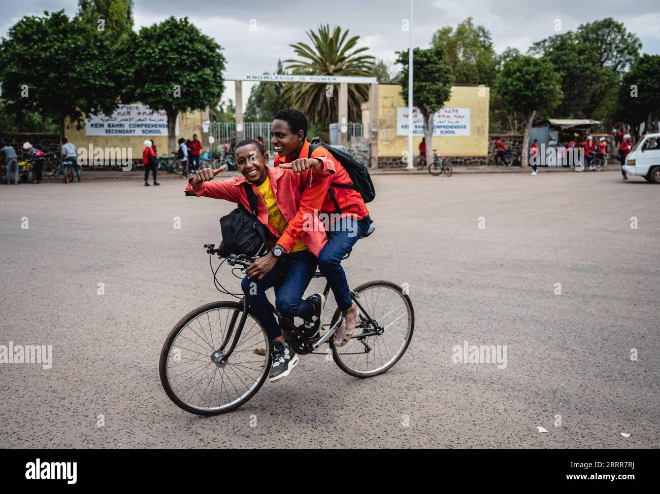 230512 -- ASMARA, May 12, 2023 -- Children ride a bike in Asmara ...