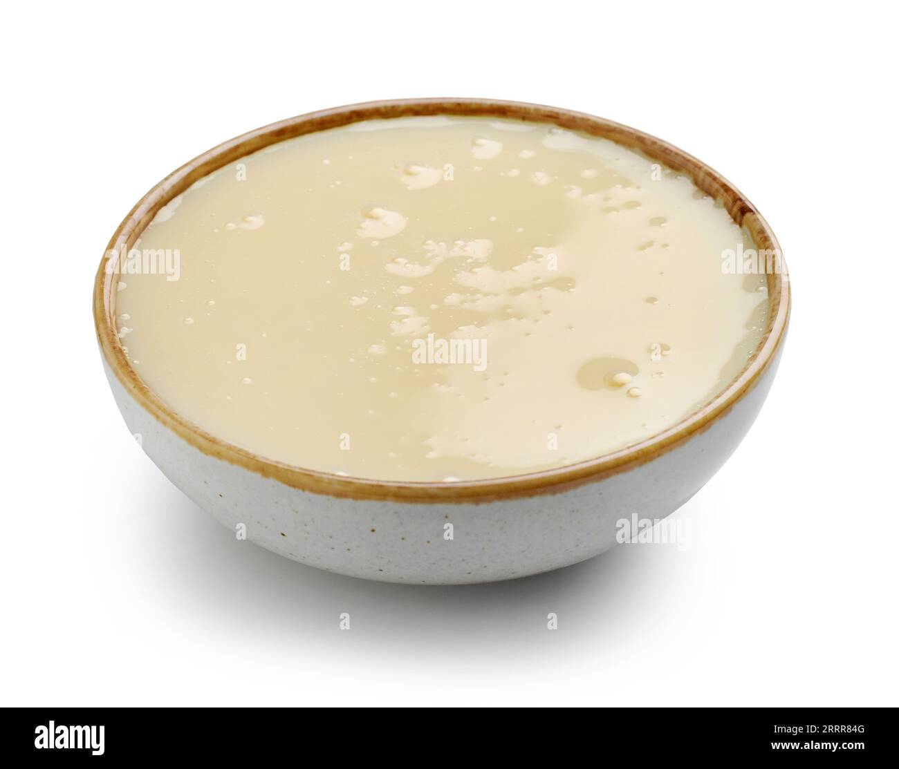 Condensed milk bowl hi-res stock photography and images - Alamy