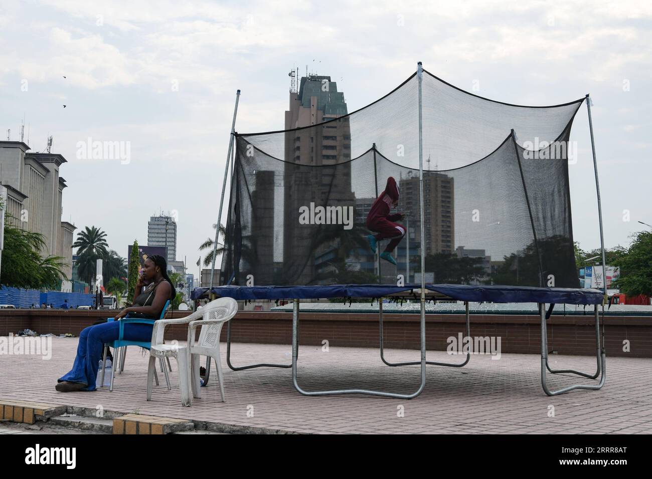 230514 -- KINSHASA, May 14, 2023 -- Local residents are seen in ...