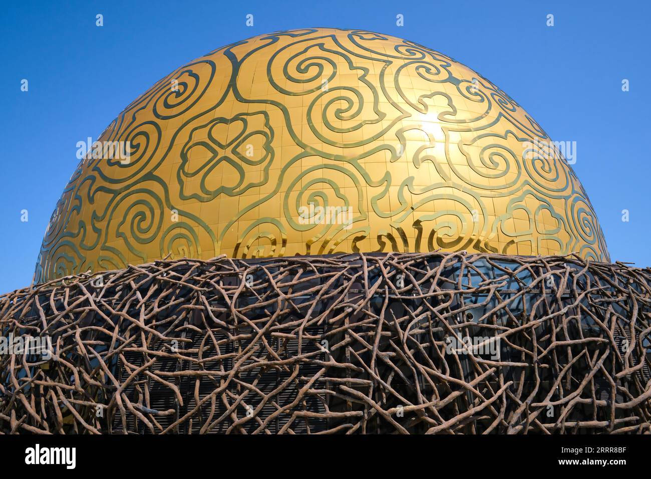 View of the gold dome, bird's nest design of the Samruk Flying Theater ...
