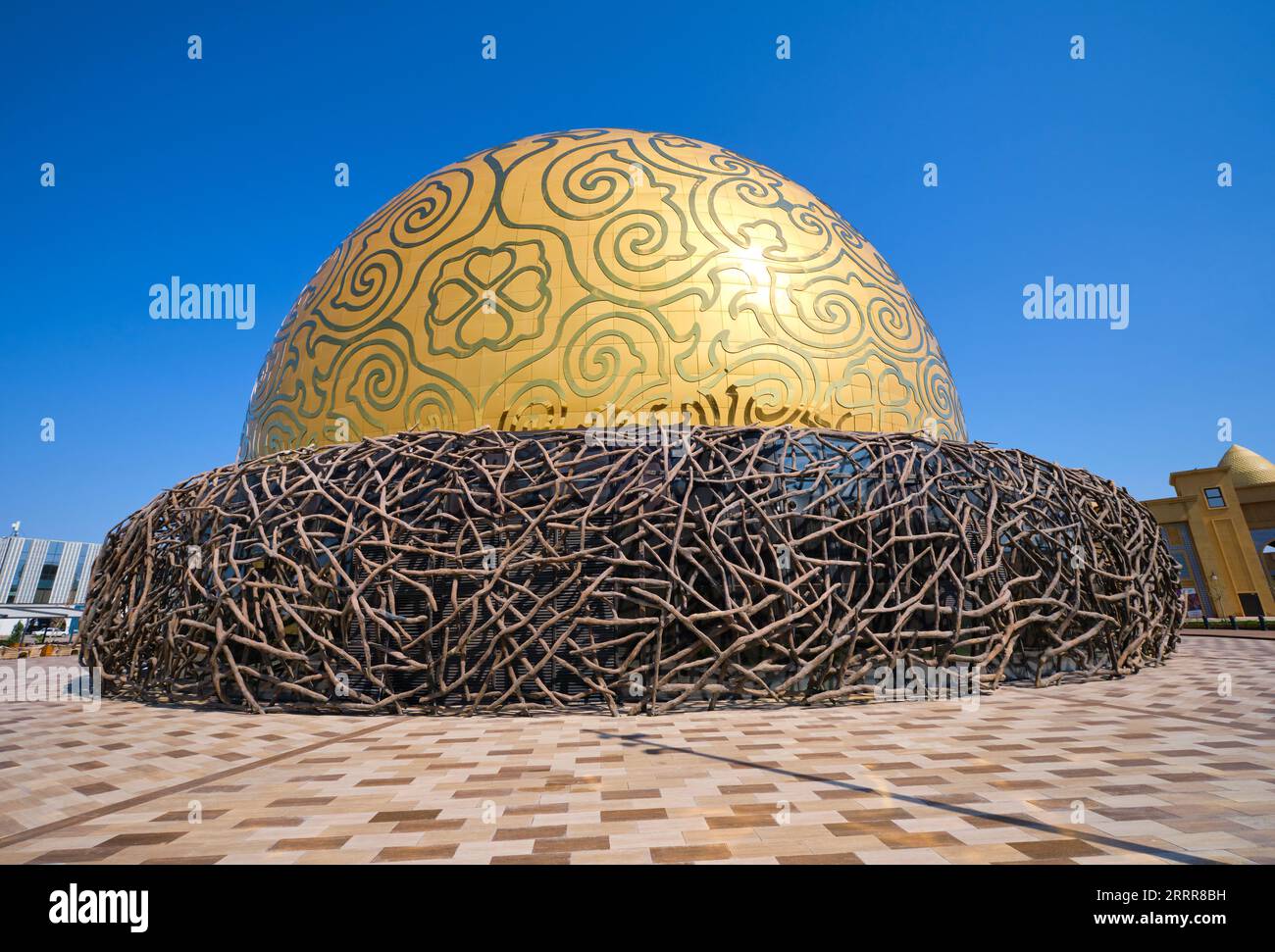 View of the gold dome, bird's nest design of the Samruk Flying Theater ...