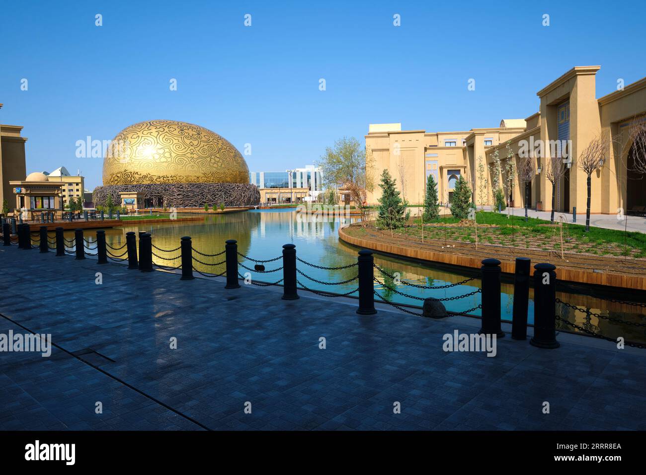 View of the gold dome, bird's nest design of the Samruk Flying Theater ...