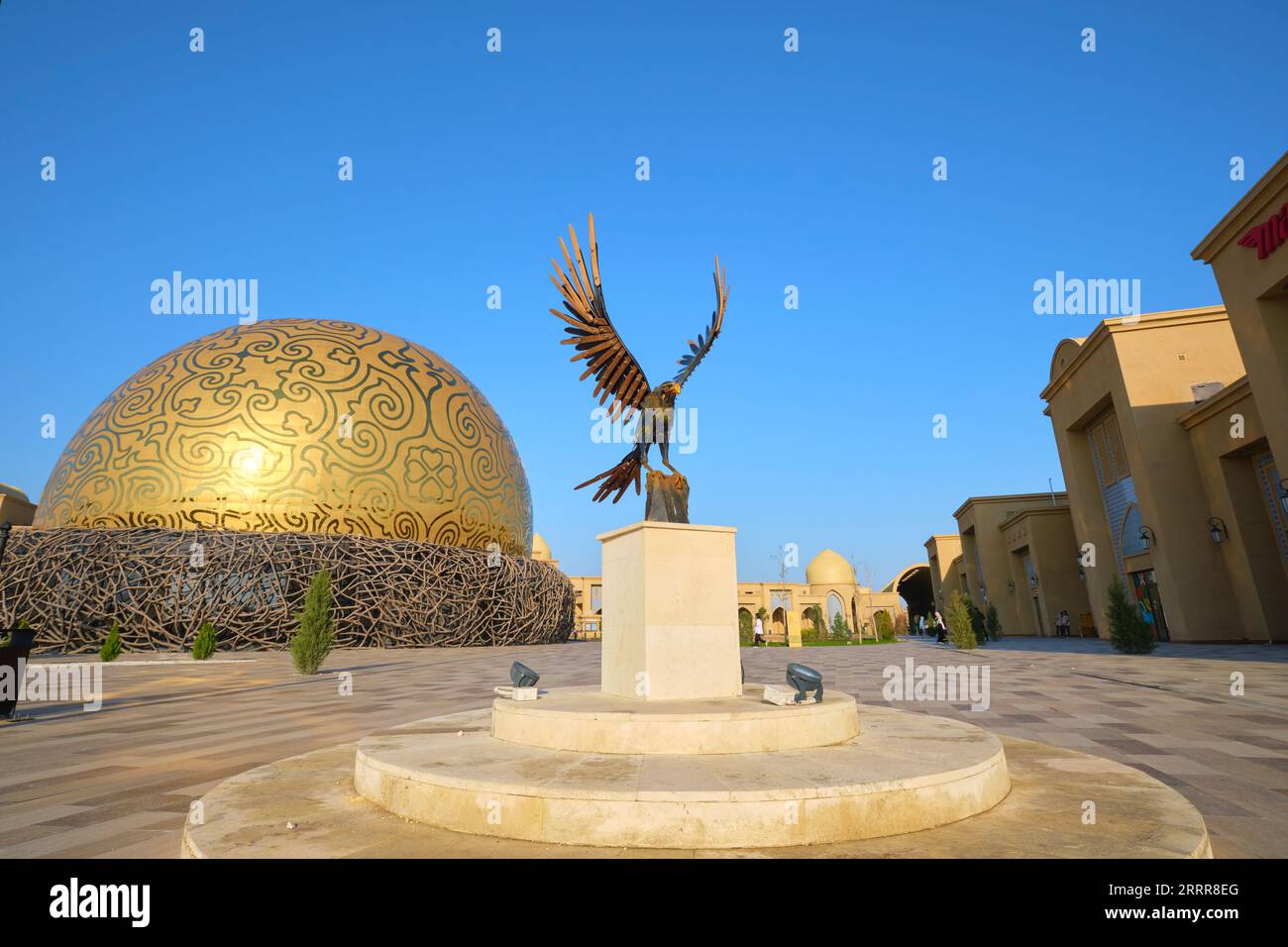 View of the gold dome, bird's nest design of the Samruk Flying Theater ...