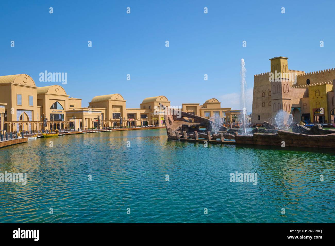 View of the giant manmade lake, old ship ruin fountain and shopping ...
