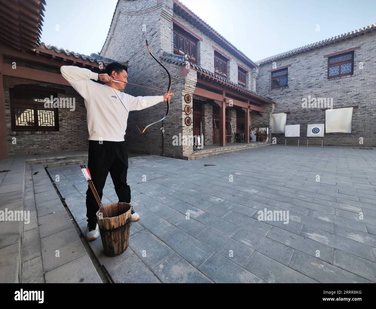 230515 -- URUMQI, May 15, 2023 -- This photo taken via a mobile phone shows Zhao Hu pulling the ...