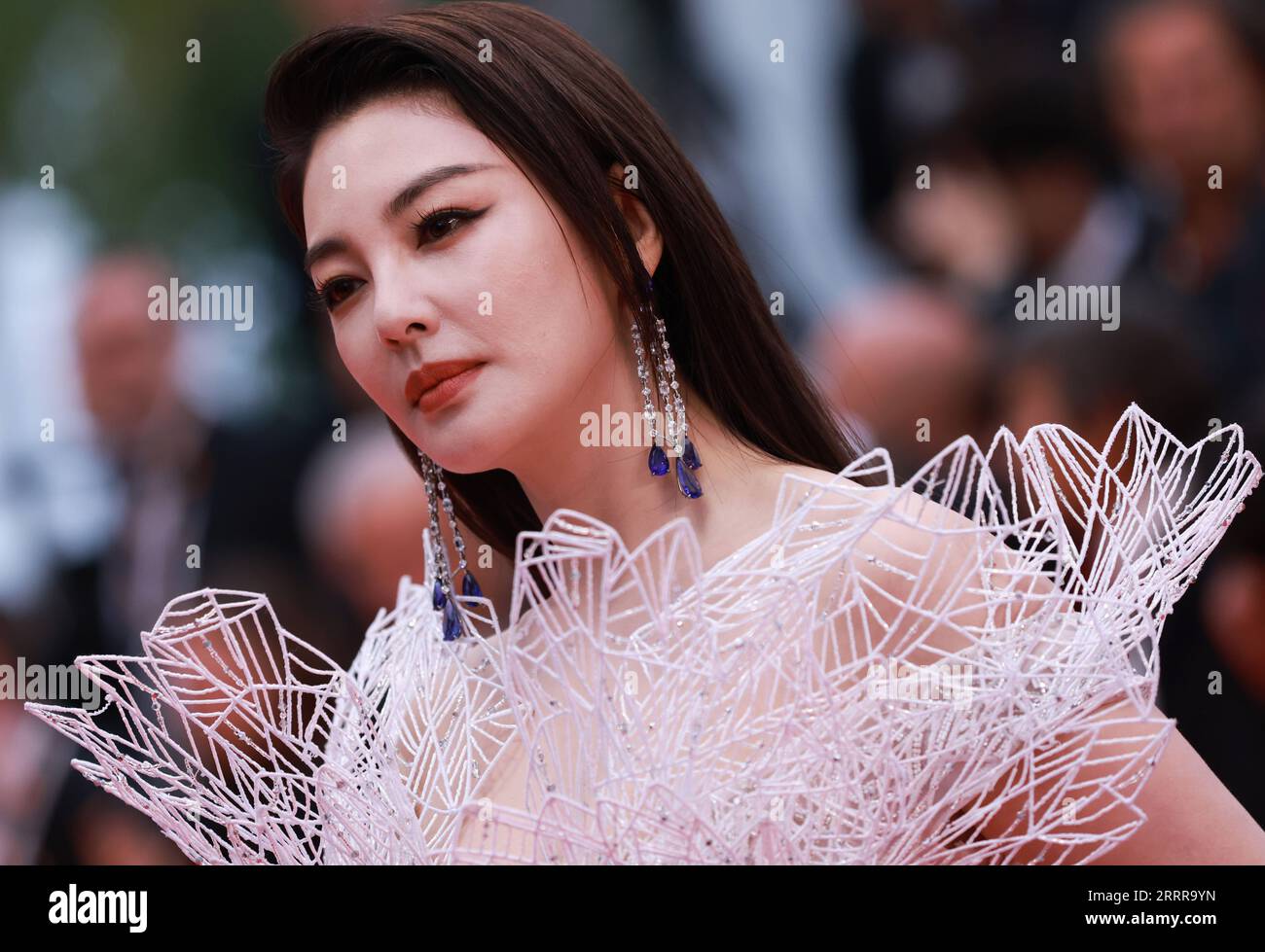 230518 -- CANNES, May 18, 2023 -- Actress Zhang Yuqi poses as she arrives for the screening of ...
