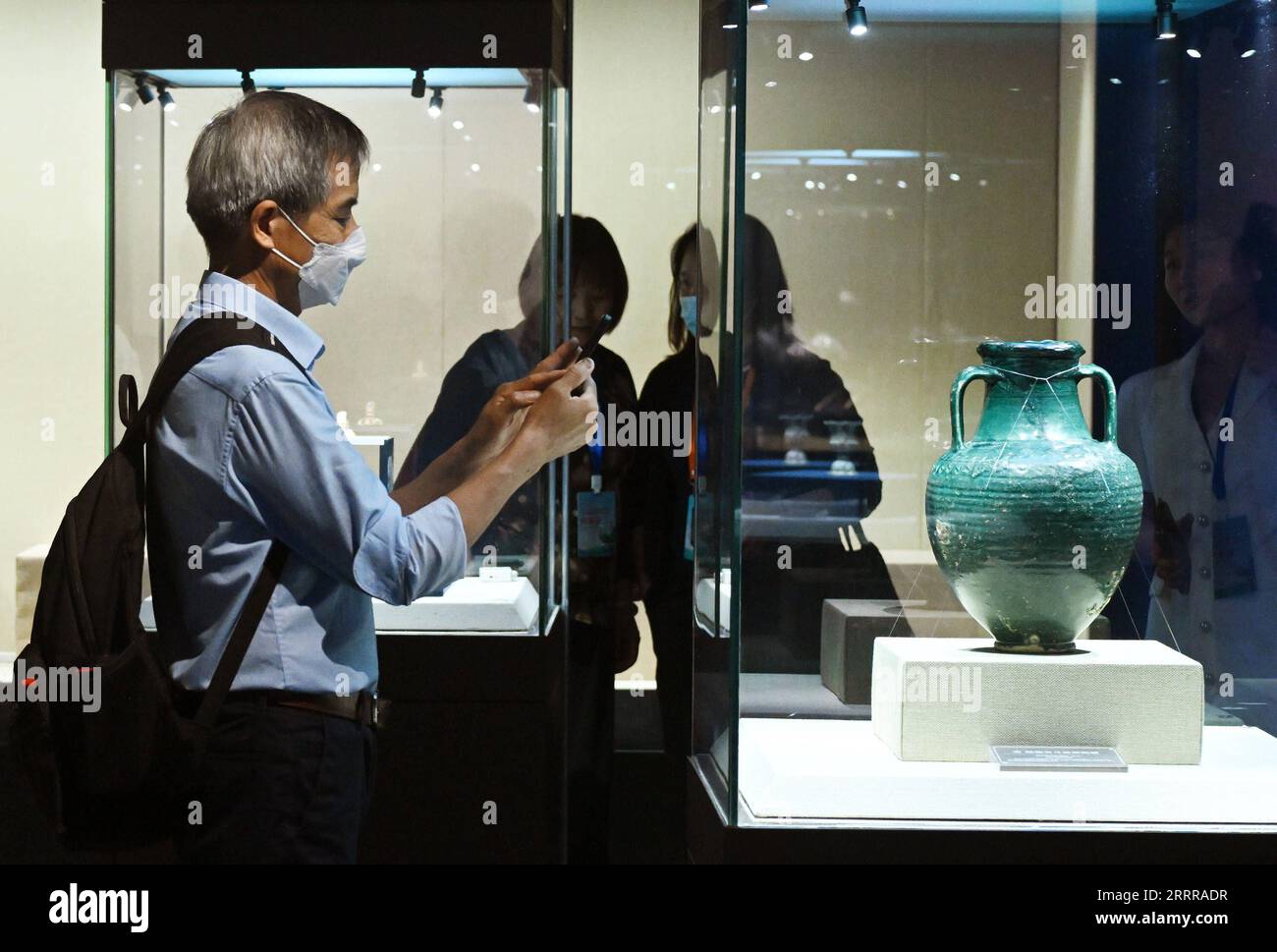 230518 -- FUZHOU, May 18, 2023 -- People visit a themed exhibition on ...