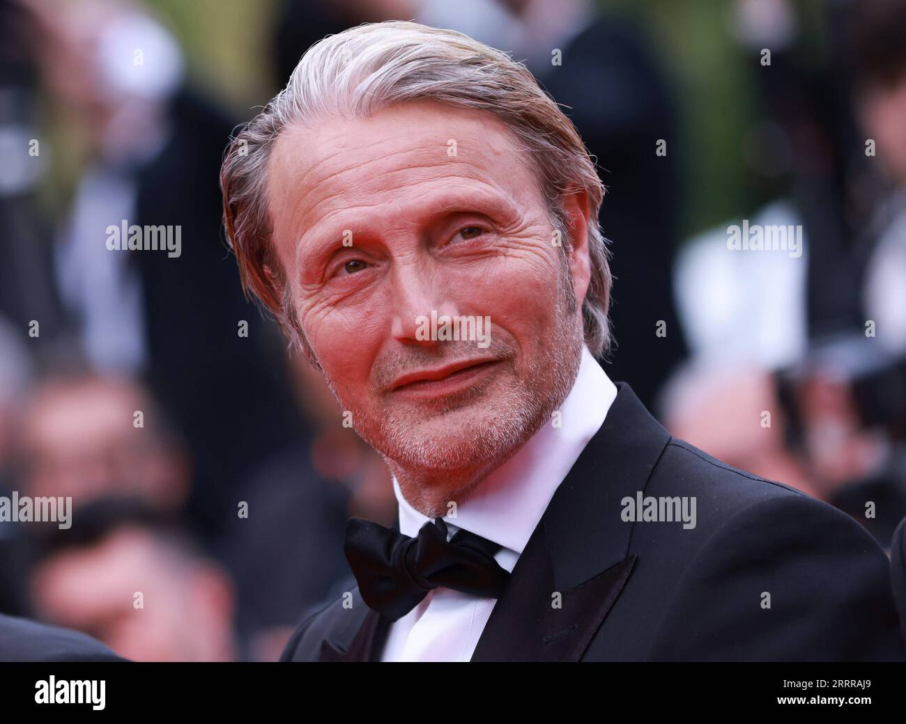 230519 -- CANNES, May 19, 2023 -- Danish actor Mads Mikkelsen poses ...