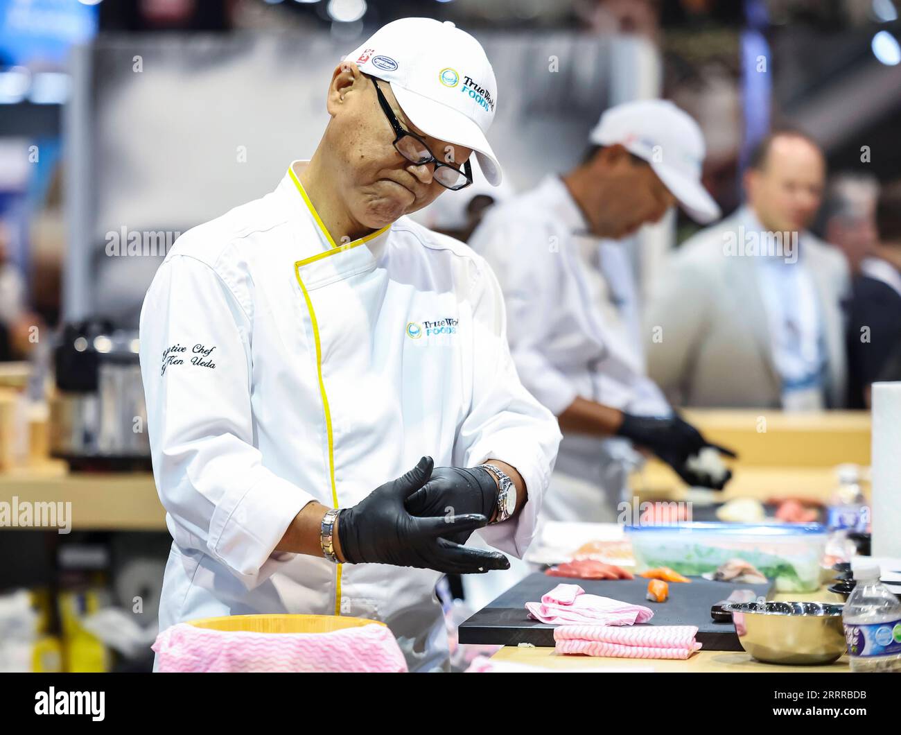 230521 -- CHICAGO, May 21, 2023 -- An exhibitor rolls sushi rice during ...