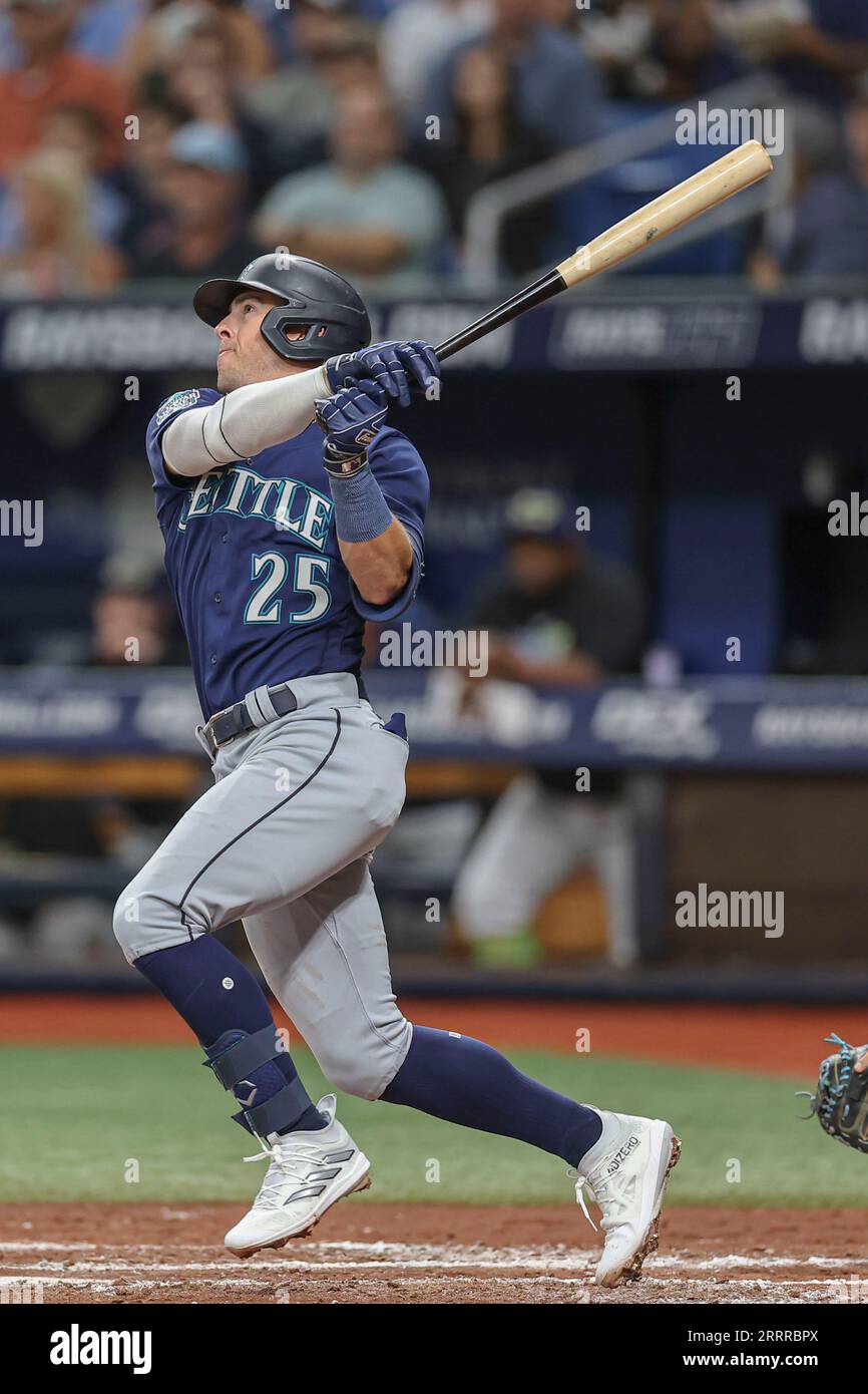 St. Petersburg, FL USA; Seattle Mariners left fielder Dylan Moore (25) hits a double and scores ...