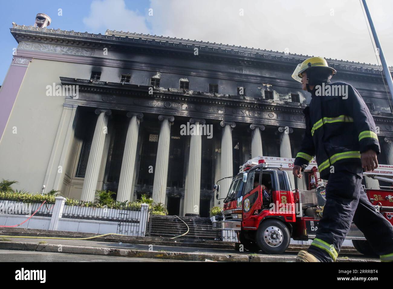 230522 -- MANILA, May 22, 2023 -- A firefighter is seen in front of the ...