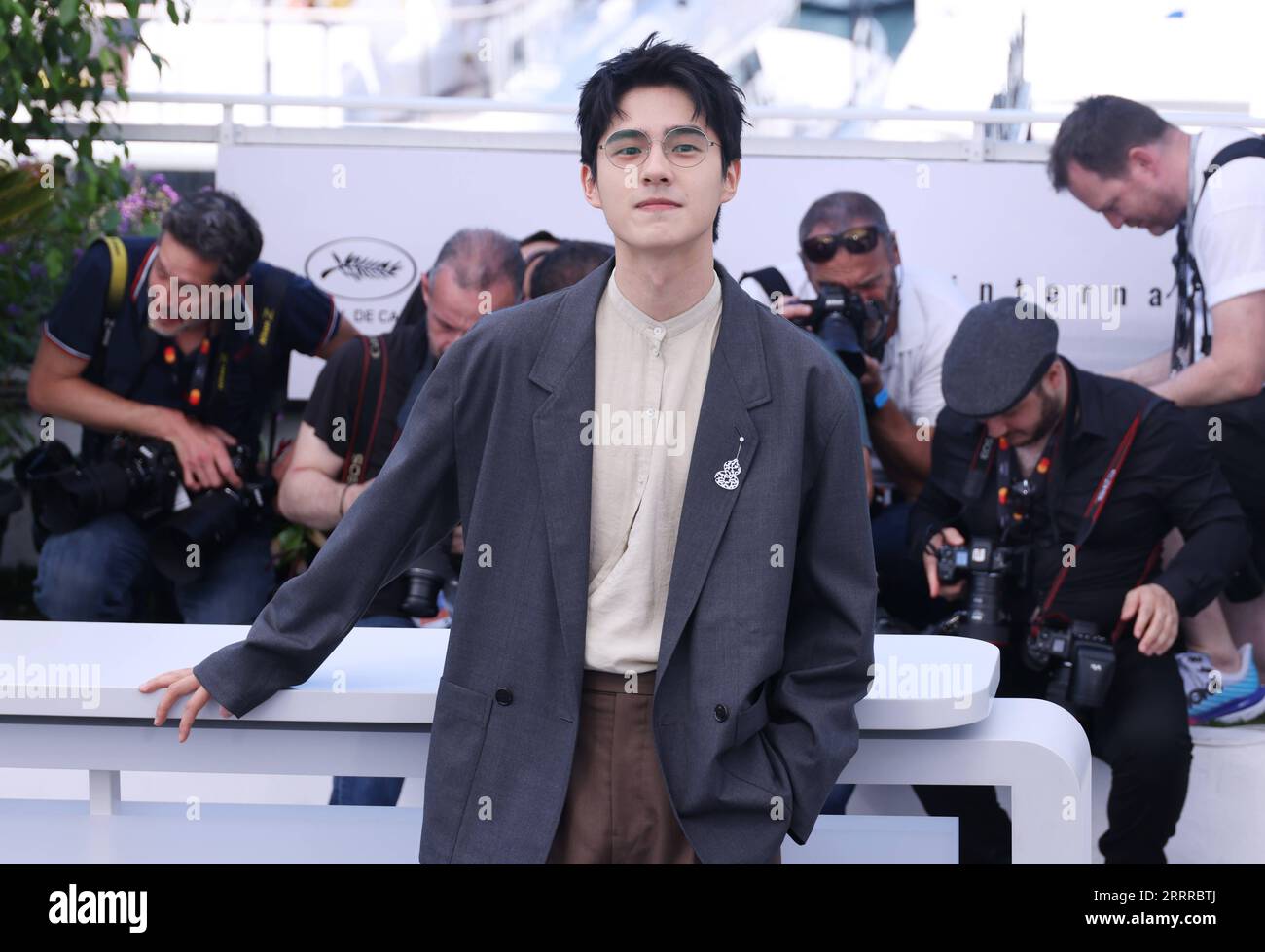 230522 -- CANNES, May 22, 2023 -- Chinese actor Liu Haoran poses during ...