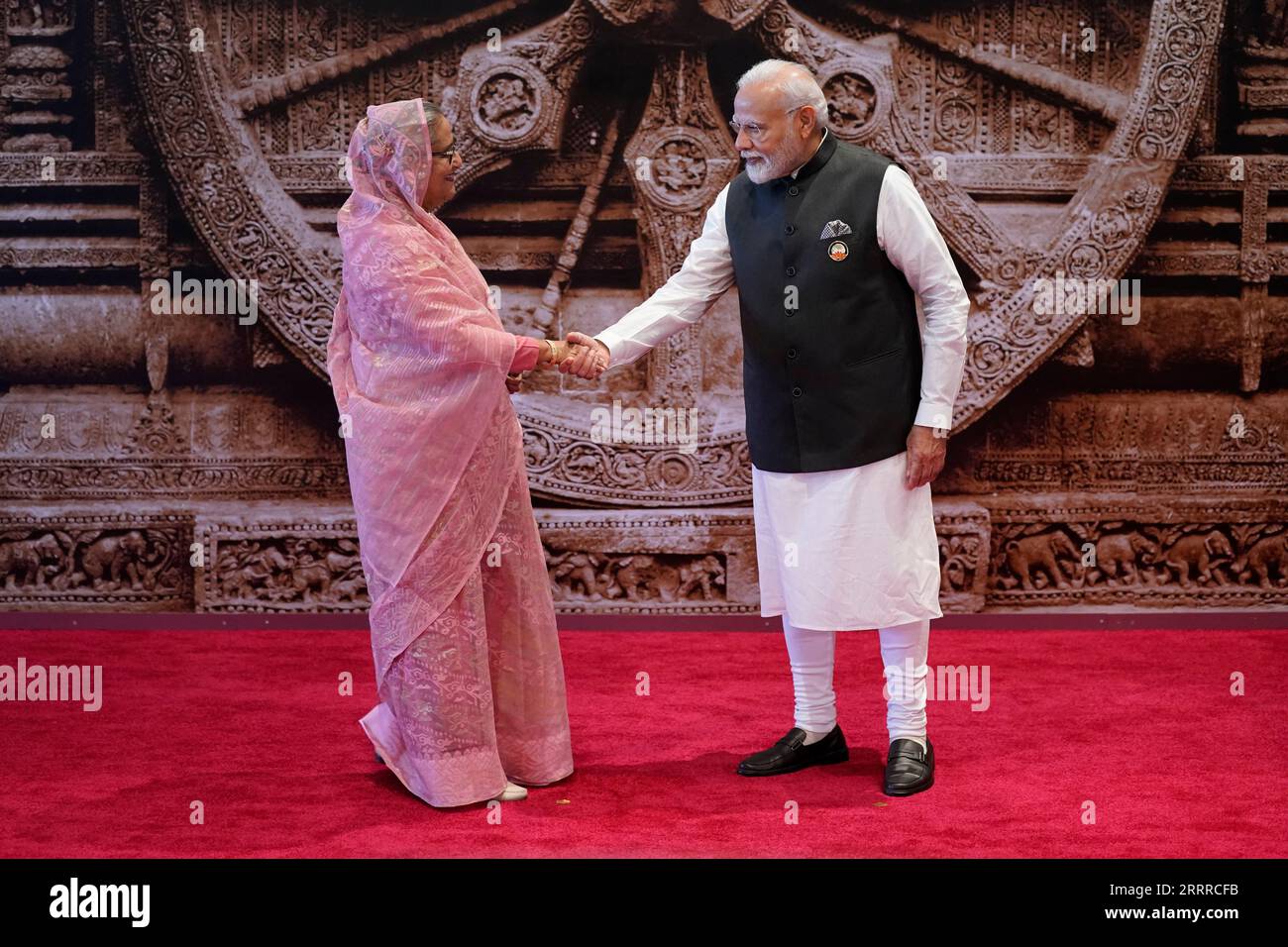 Indian Prime Minister Narendra Modi, right, shakes hand with Bangladesh ...