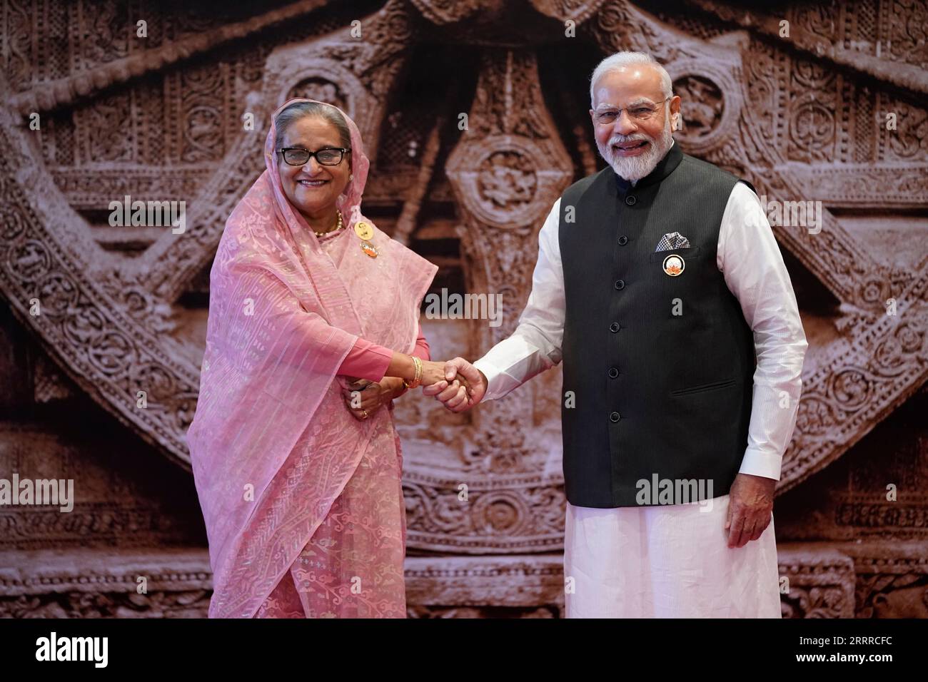 Indian Prime Minister Narendra Modi, right, shakes hand with Bangladesh ...