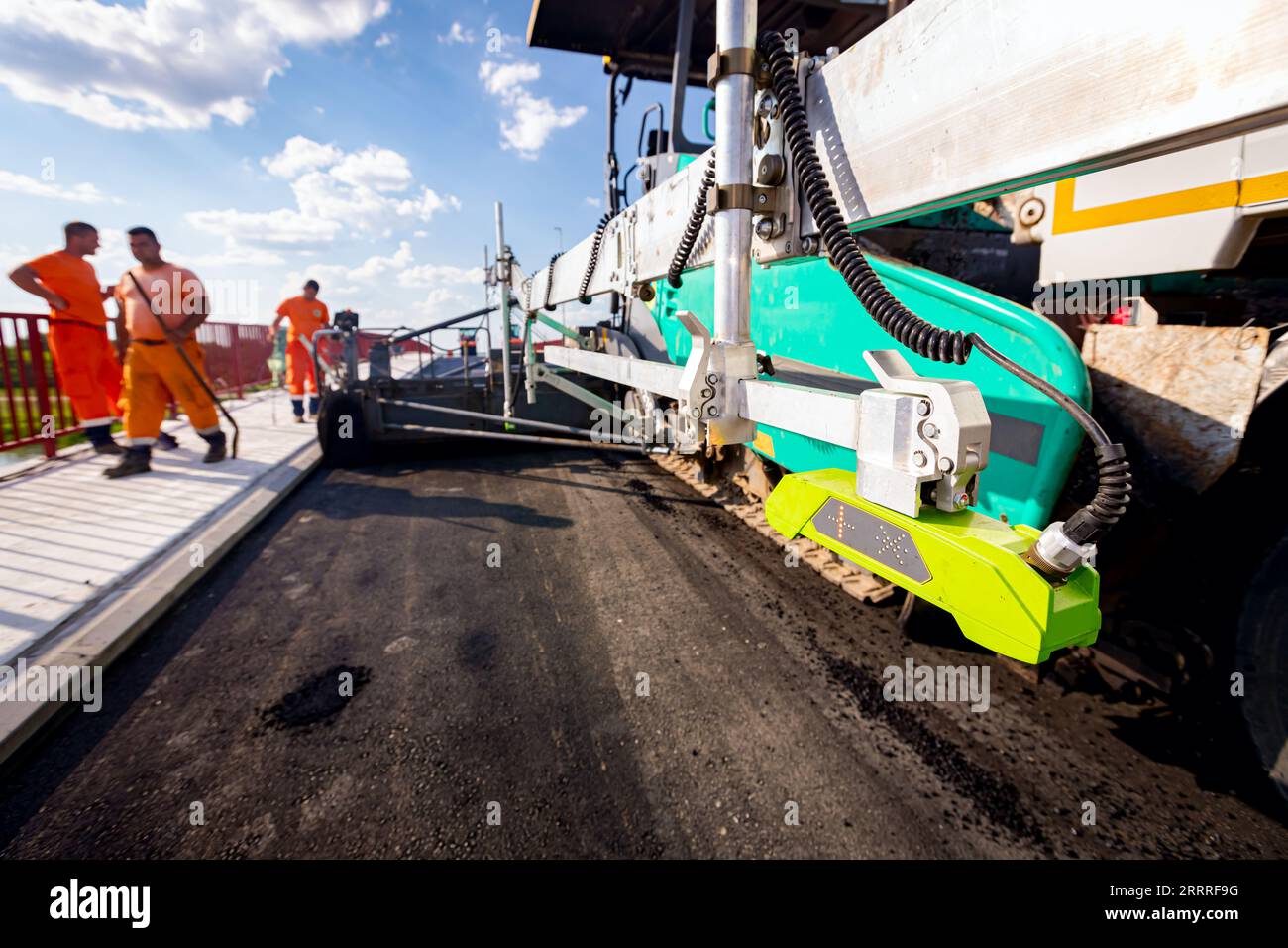 Road laying construction machine with ultrasonic grade, slope, non ...