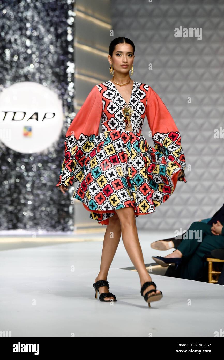 230526 -- KARACHI PAKISTAN, May 26, 2023 -- A model presents a creation ...