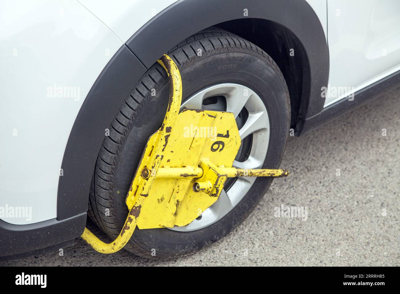 blocked car wheels Stock Photo - Alamy
