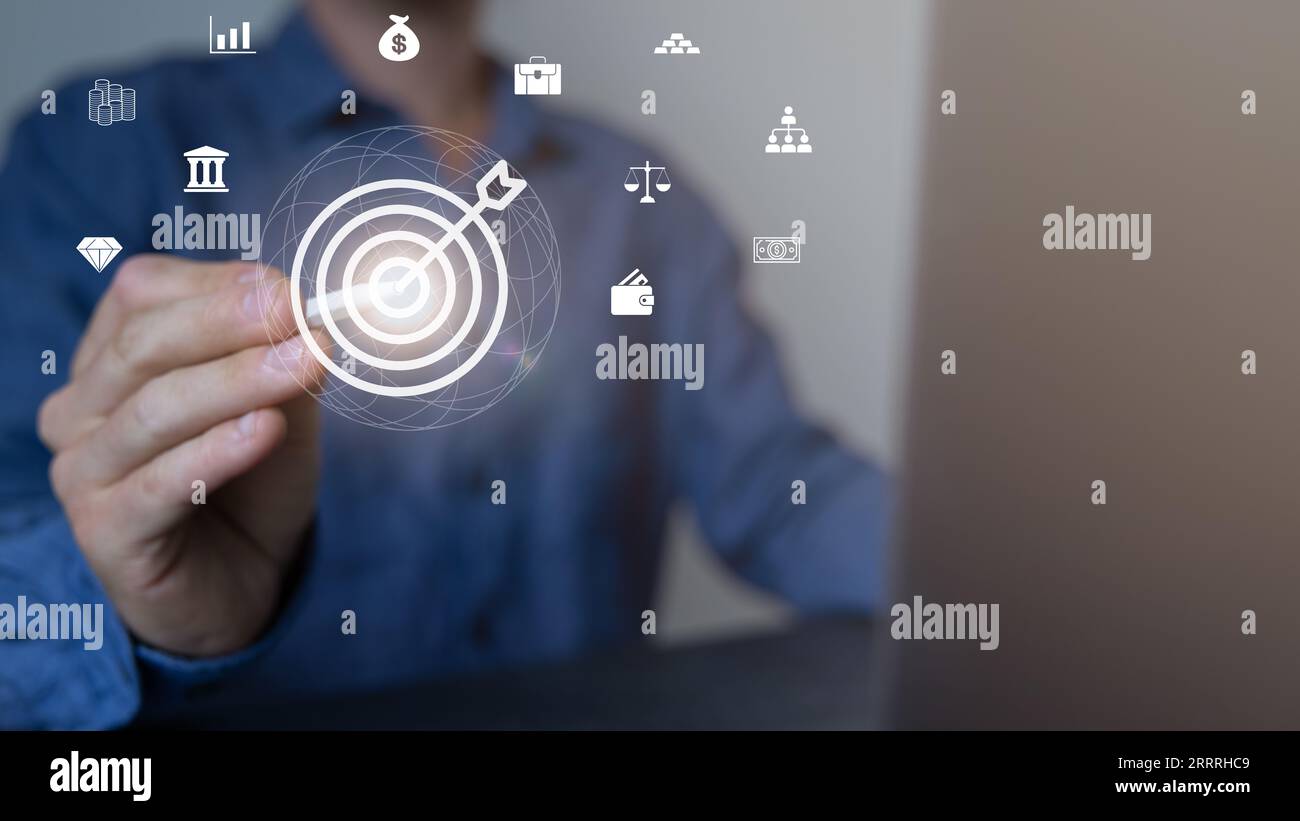 Digital marketing. Businessman touching darts aiming at the target ... Digital marketing. Businessman touching darts aiming at the target ...