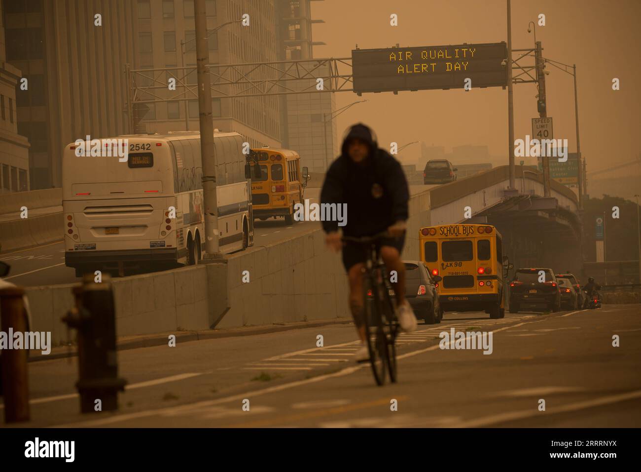 230608 New York June 8 2023 A Cyclist Rides A Bike Passing An