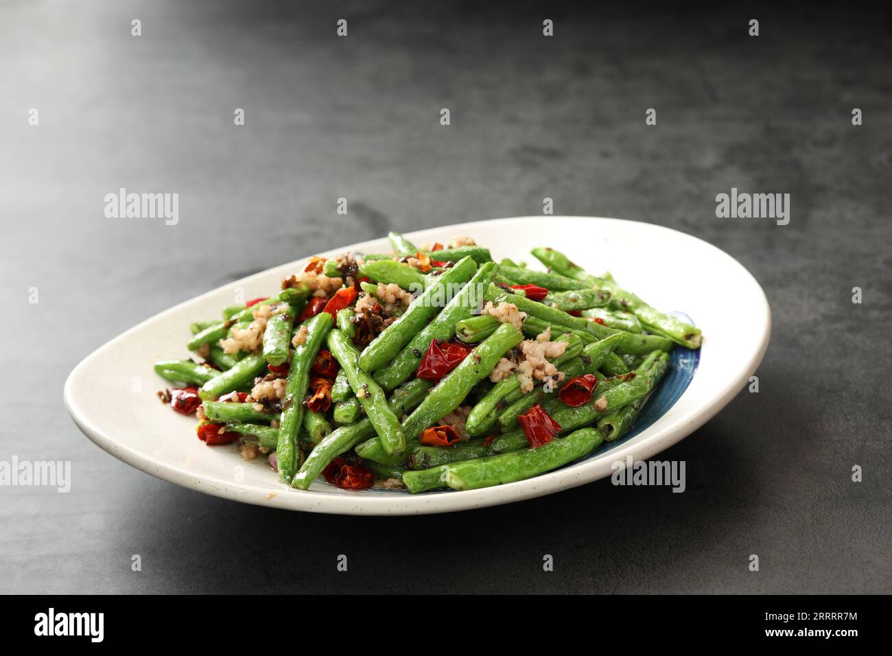 Wok-Fried French Beans with Shallots and Minced Pork Stock Photo - Alamy