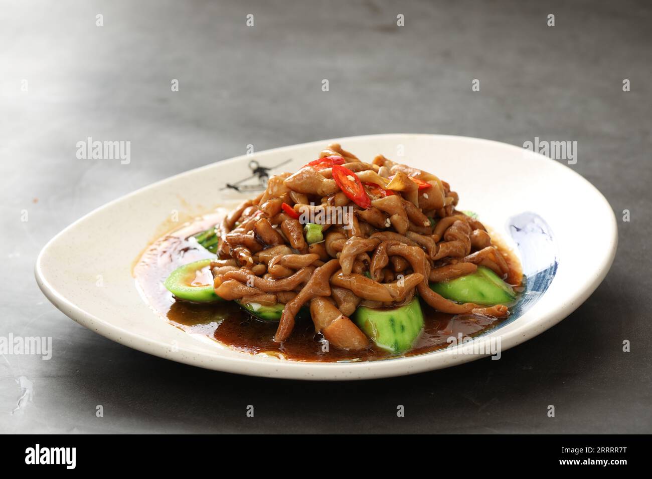 Wok-Fried Goose intestines with Black Bean Sauce Stock Photo - Alamy