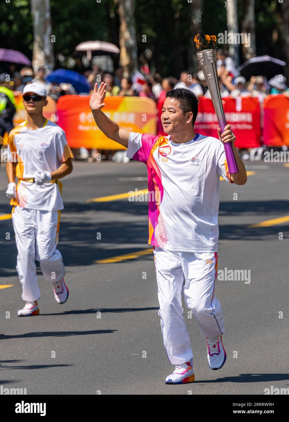 Huzhou, China's Zhejiang Province. 9th Sep, 2023. Torch bearer Chen ...