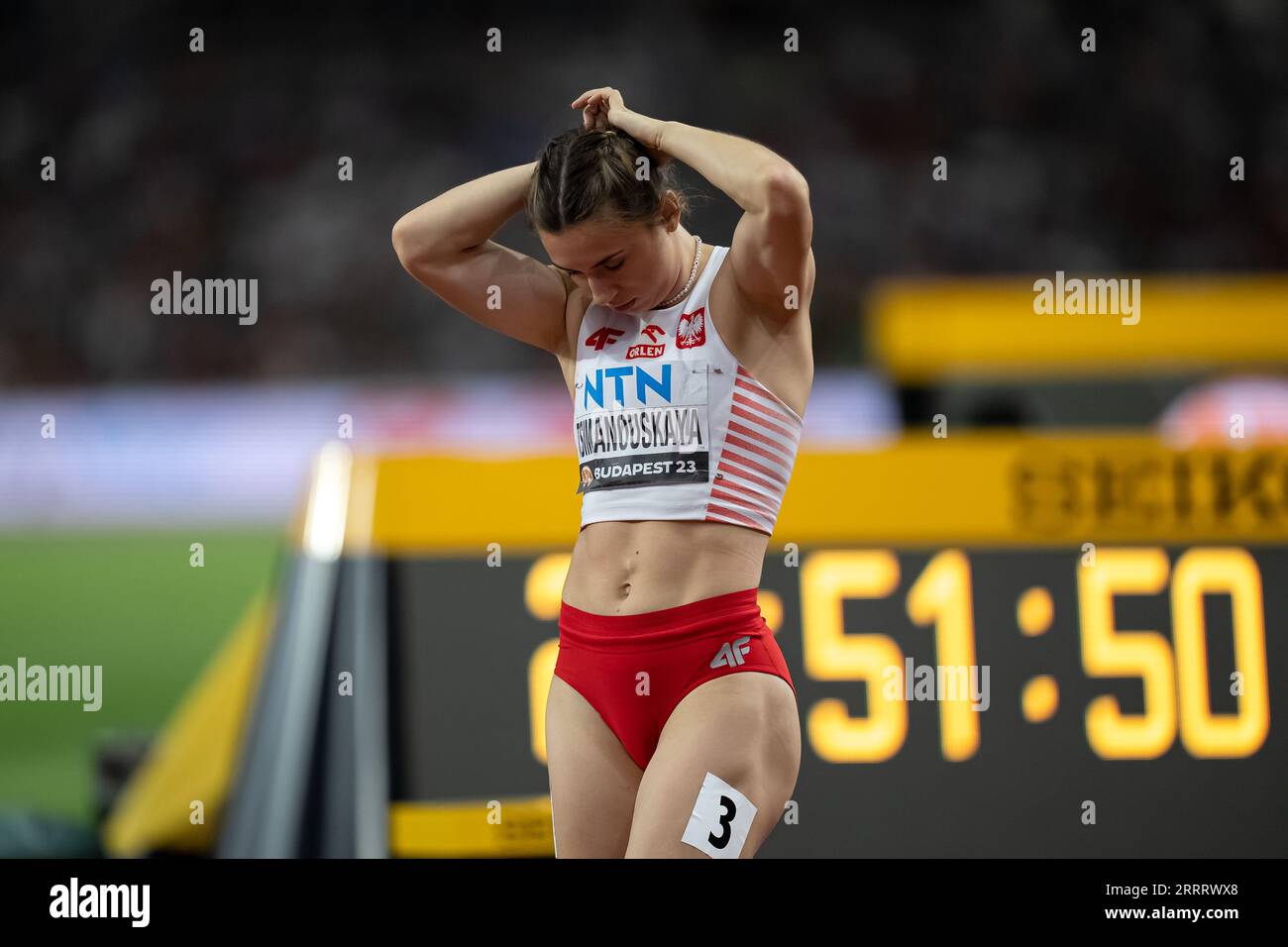 Kristina Timanóvskaya participating in the 4X100 meters relay at the ...