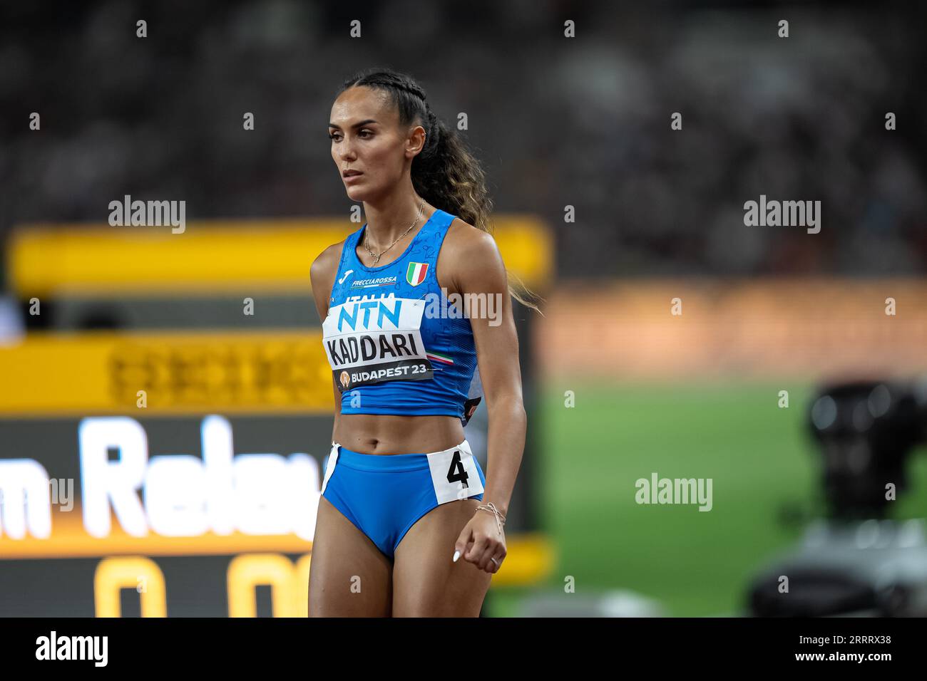 Dalia Kaddari participating in the 4X100 meters relay at the World ...