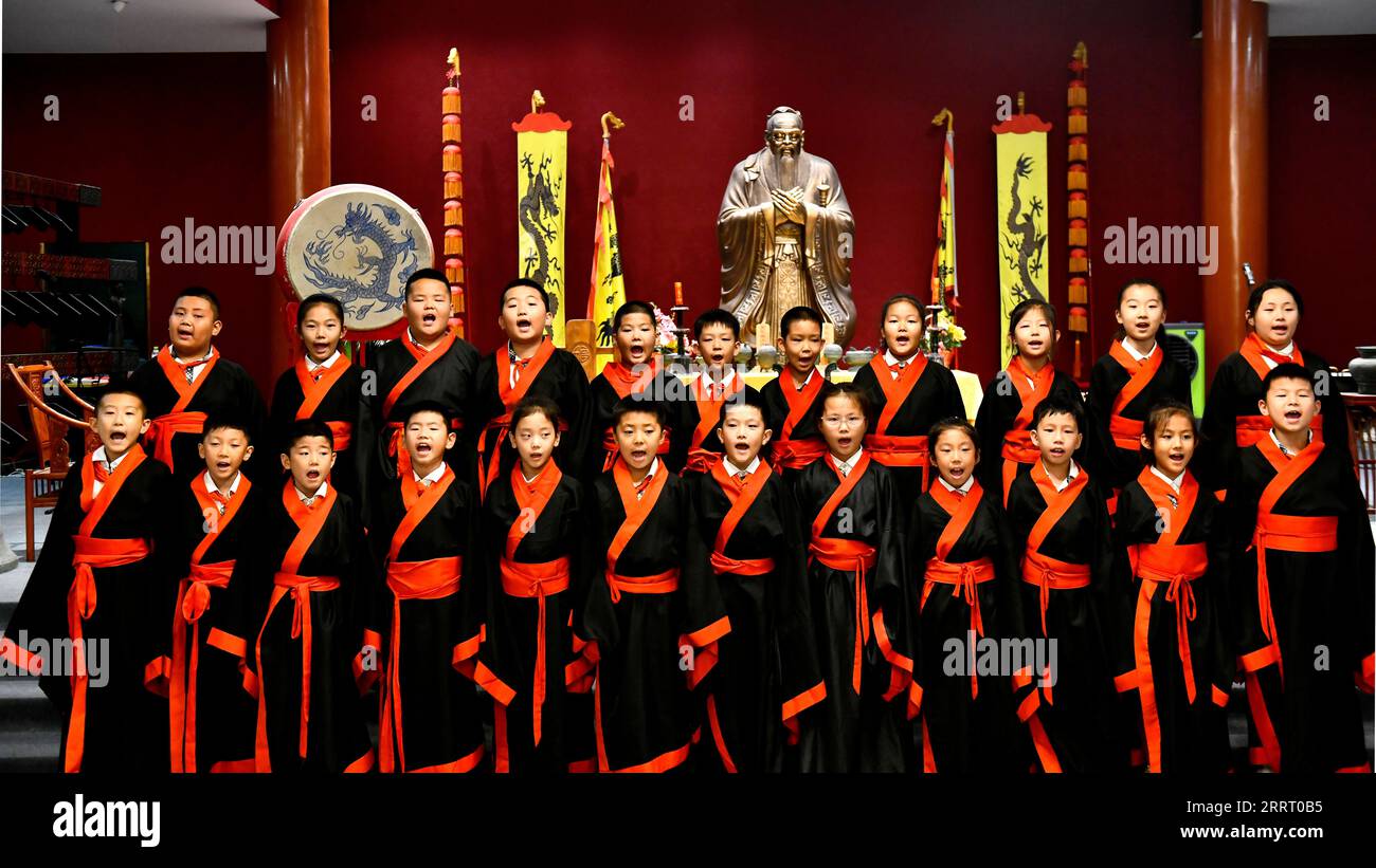 230620 -- QUFU, June 20, 2023 -- Students from Jinan City recite the ...