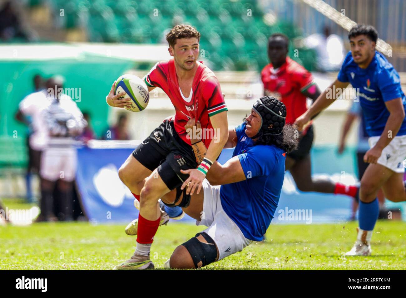 Kenya Under 20 Chipu Davies Spencer (left) avoids Samoa John Mata ...