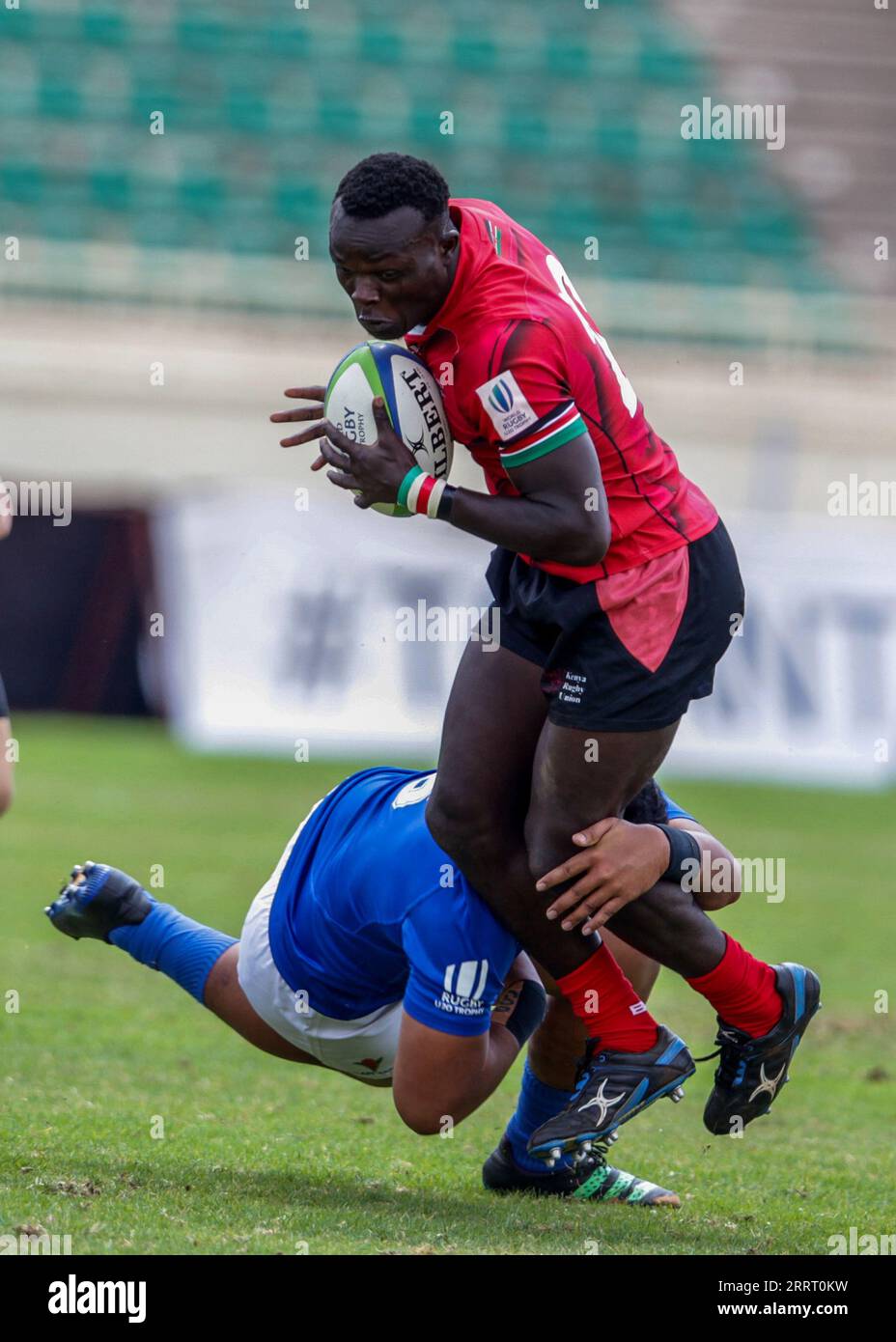 Kenya Under 20 Chipu Victor Odhiambo (left) avoids Samoa Junior Tuala ...
