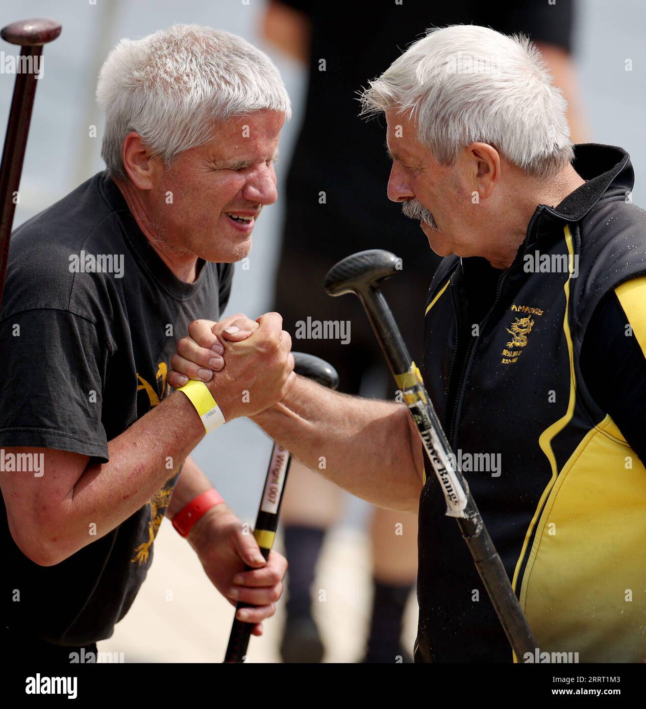 230623 -- LONDON, June 23, 2023 -- David Bangs R shake hands with a ...