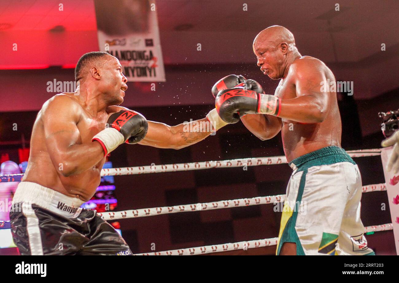 NAIROBI, KENYA - JULY 23: Kenya Daniel Wanyonyi (left) punch Tanzania ...