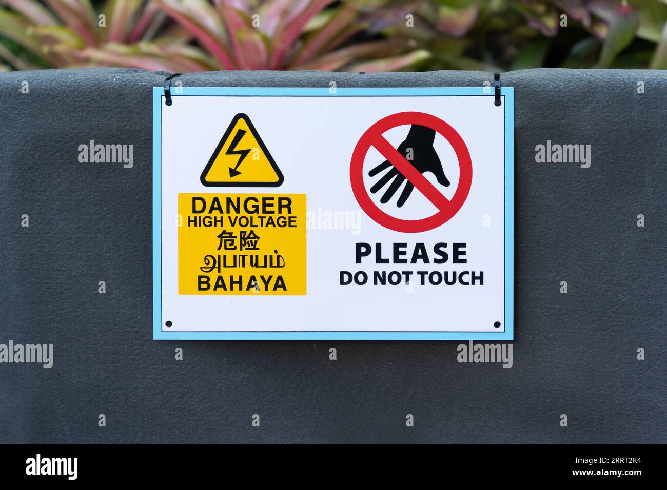 "Danger high voltage, please do not touch" sign Stock Photo - Alamy