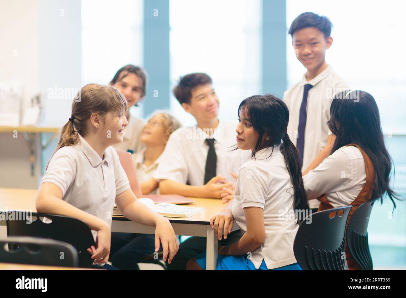 Kids go back to school. Interracial group of children of mixed age on ...