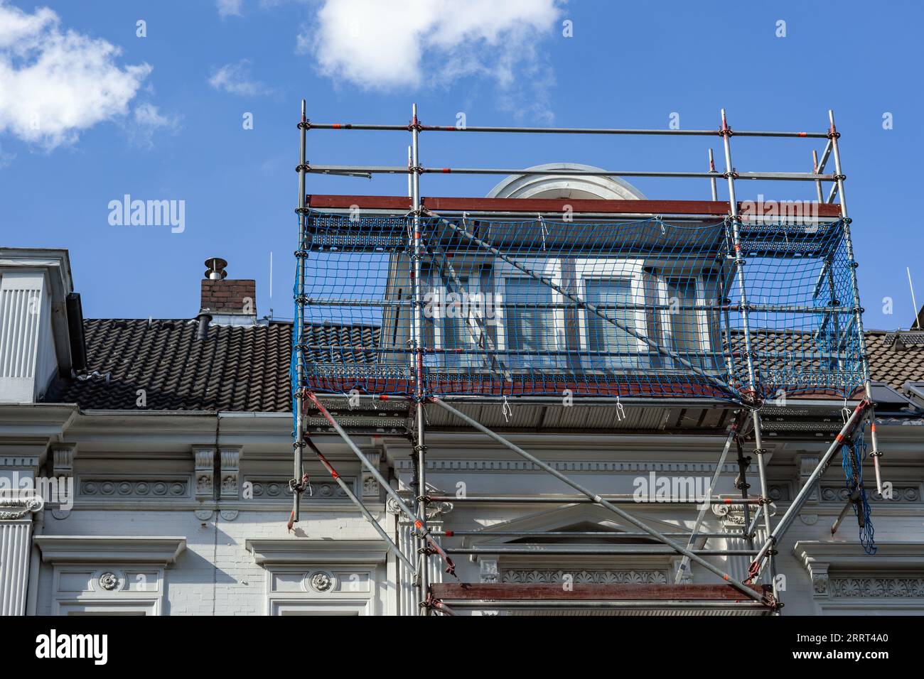 Scaffolding on the dormer of a Hamburg city villa Stock Photo - Alamy