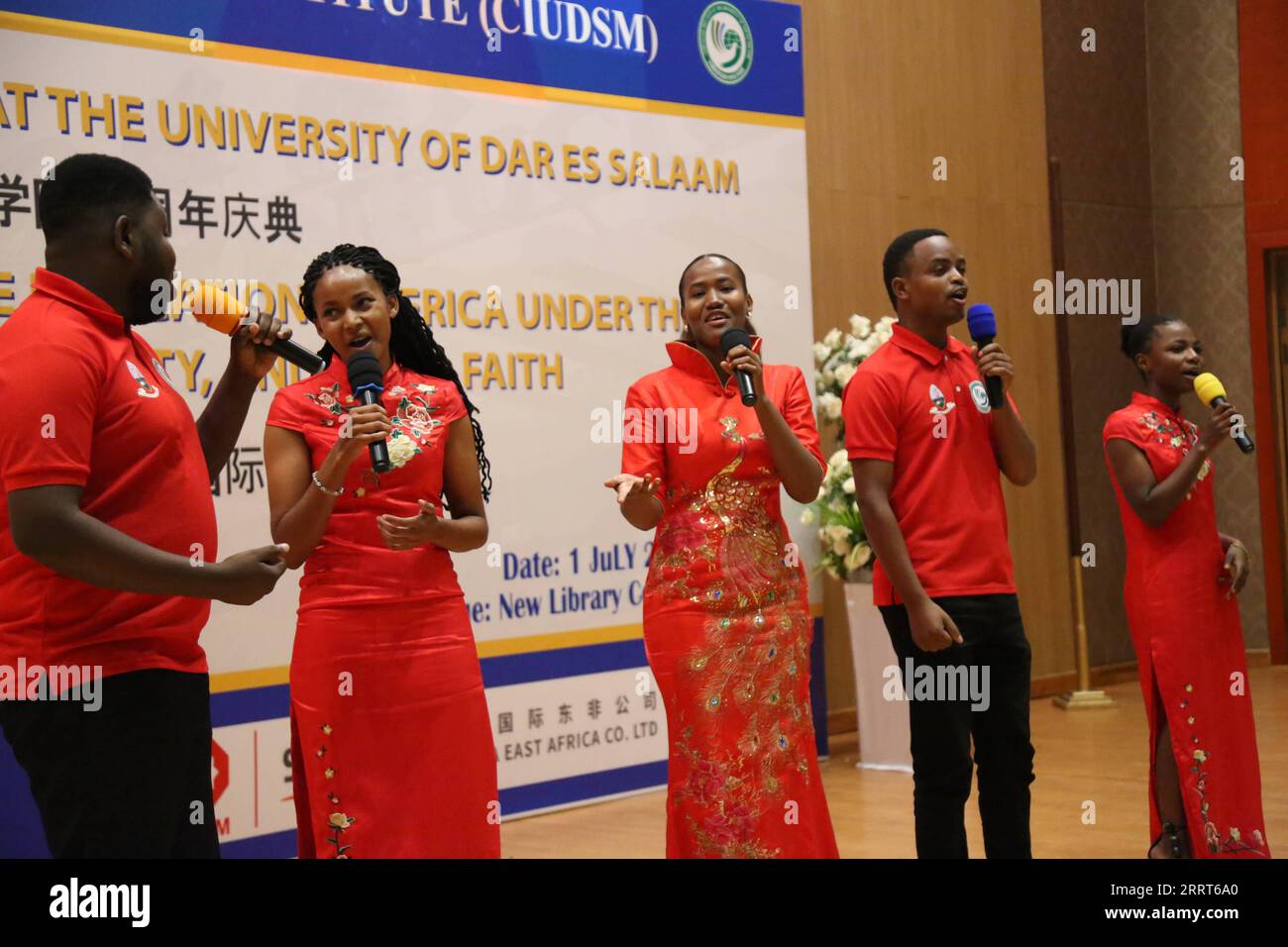 230702 -- DAR ES SALAAM, July 2, 2023 -- Tanzanian teachers sing a ...
