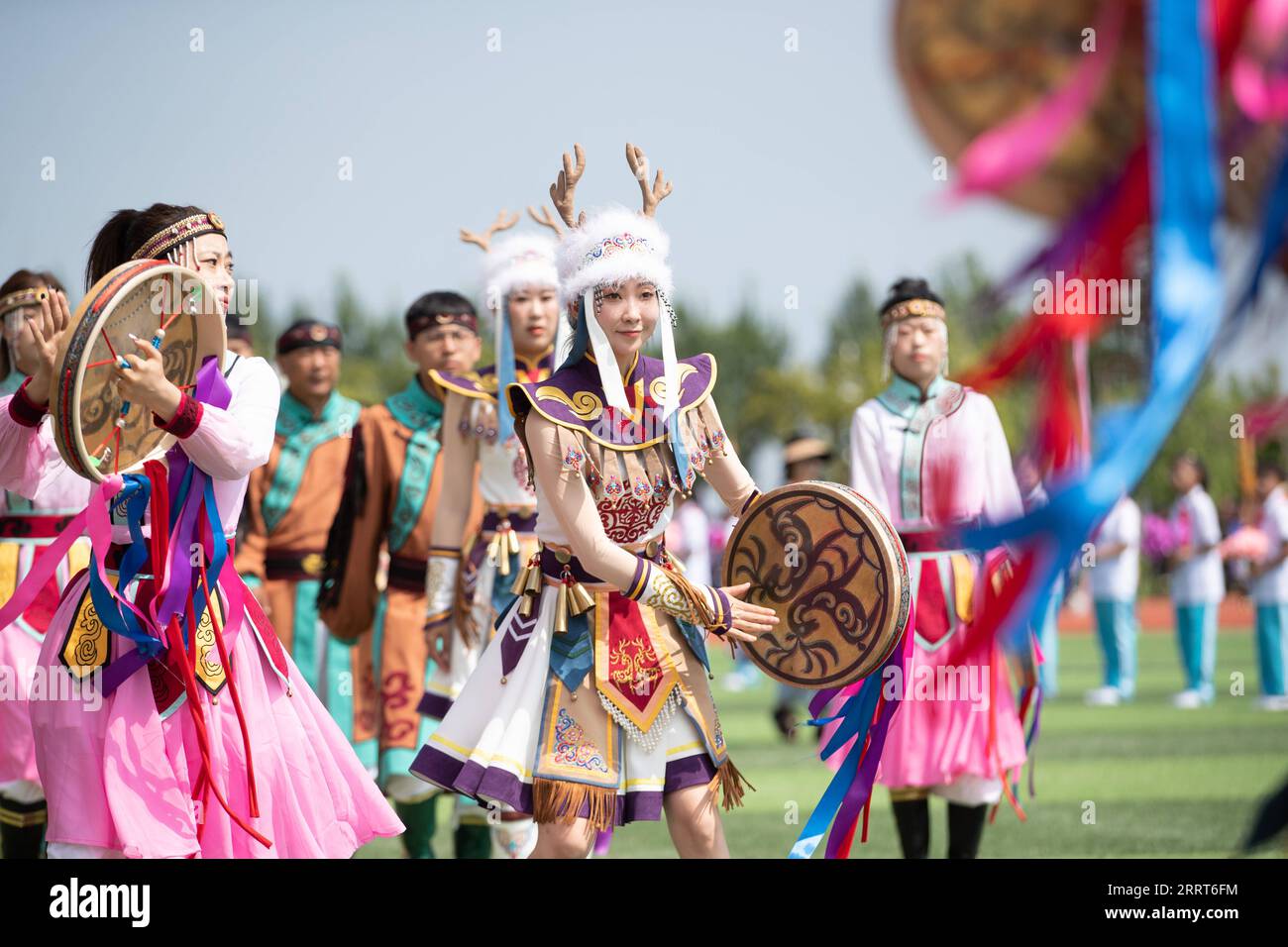 230702 -- FUYUAN, July 2, 2023 -- Hezhe people wearing traditional ...