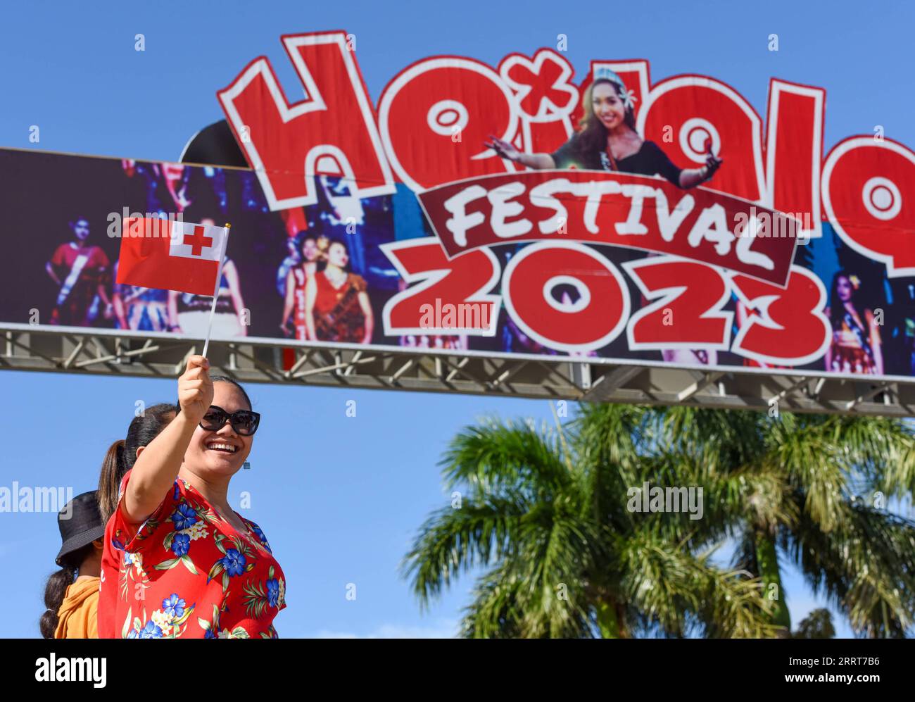 230704 -- NUKU ALOFA, July 4, 2023 -- People watch a float parade in ...